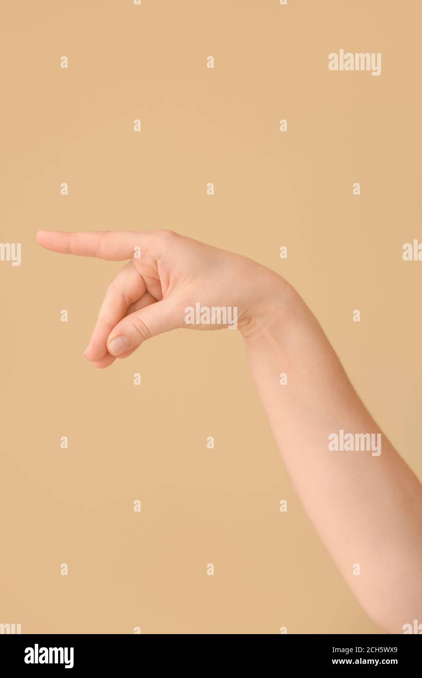 Hand showing letter Q on color background. Sign language alphabet Stock ...