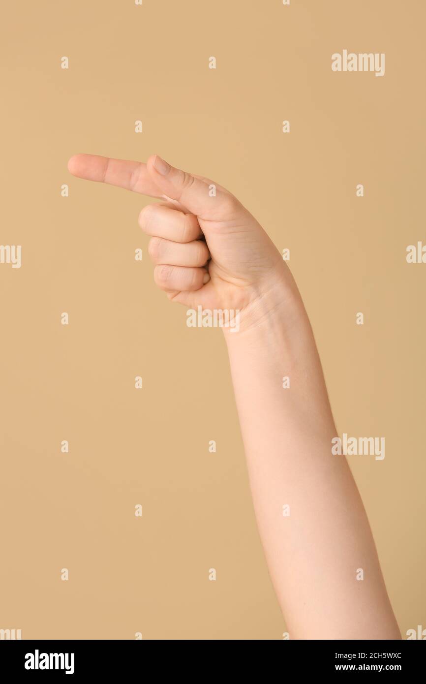 Hand showing letter G on color background. Sign language alphabet Stock ...