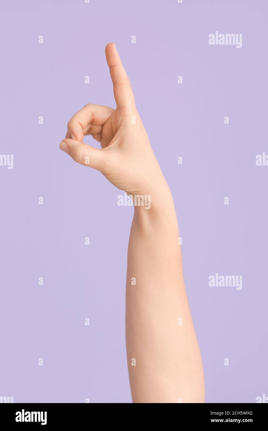 Hand showing letter D on color background. Sign language alphabet Stock ...