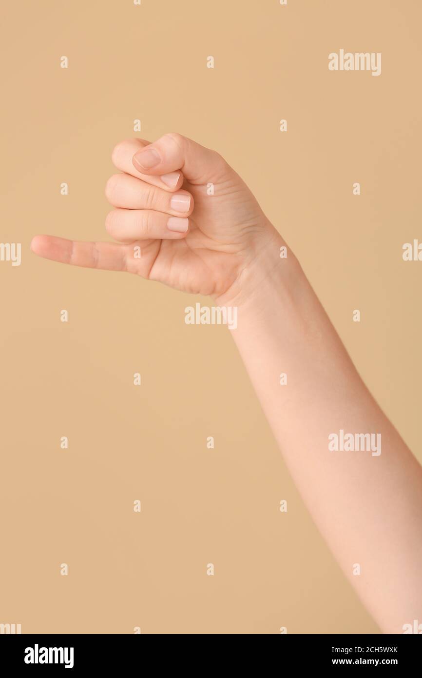 Hand showing letter J on color background. Sign language alphabet Stock ...