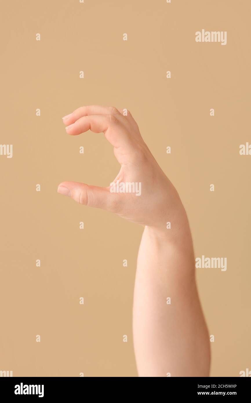 Hand showing letter C on color background. Sign language alphabet Stock ...