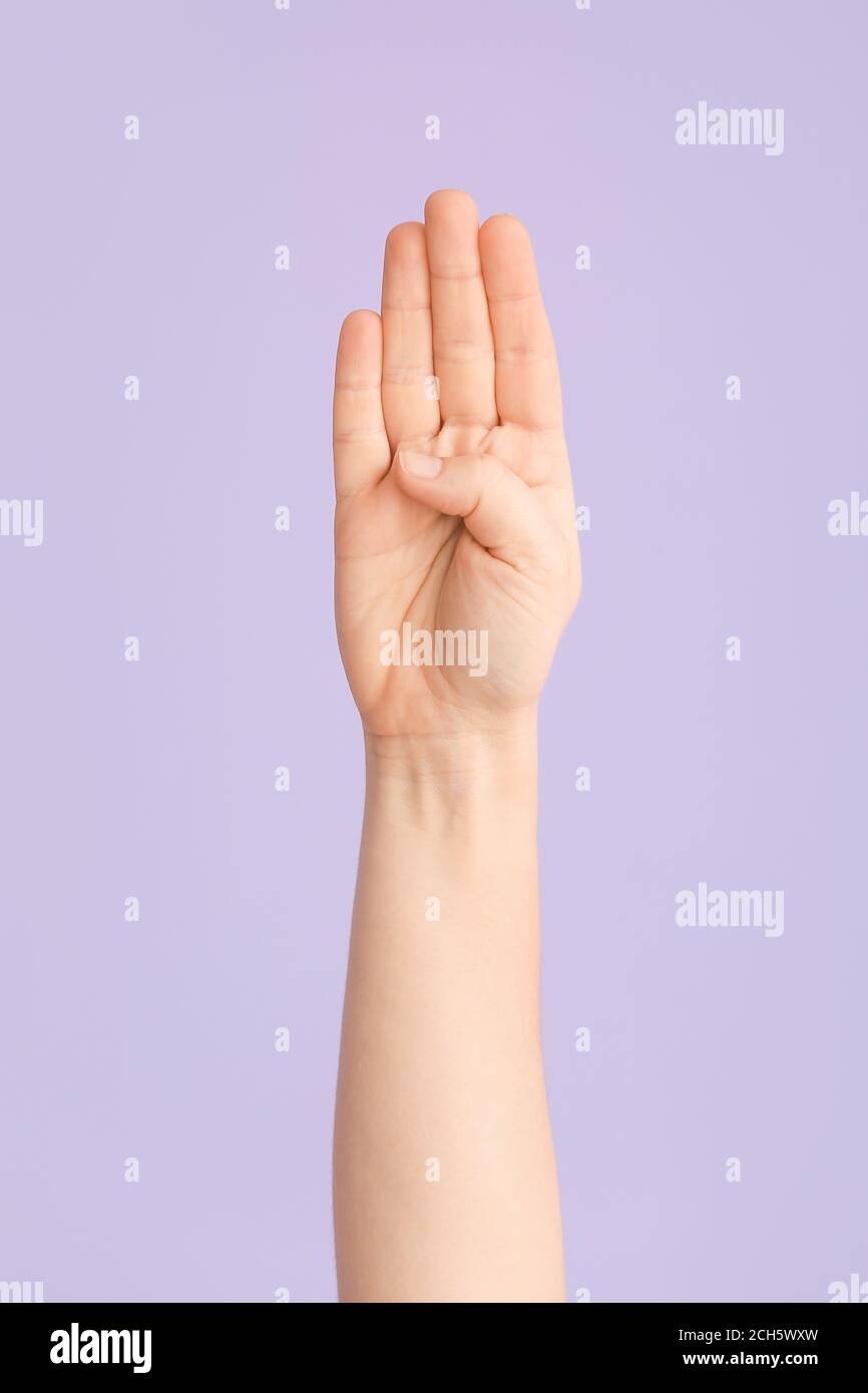 Hand showing letter B on color background. Sign language alphabet Stock ...