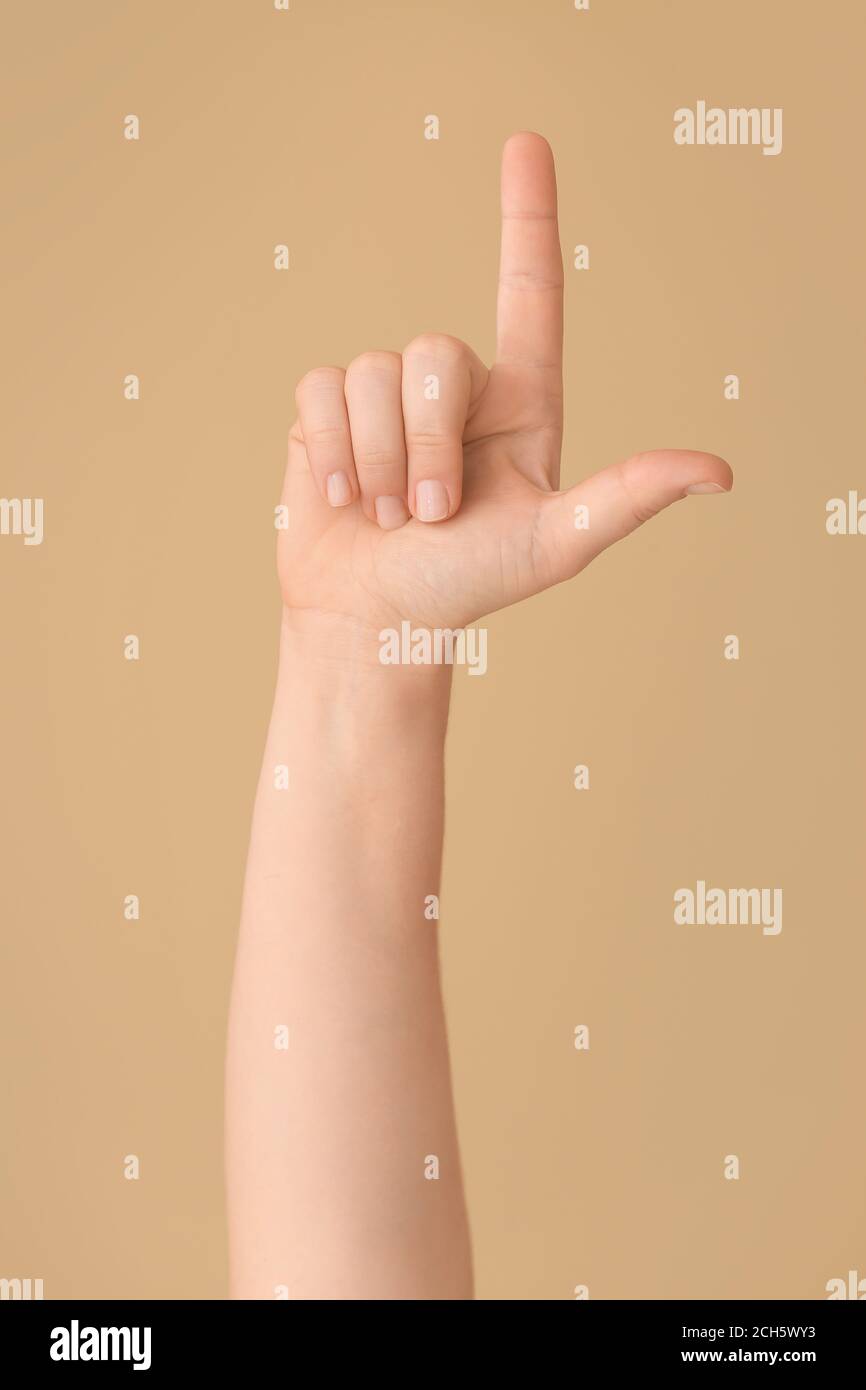 L hand sign woman hi-res stock photography and images - Alamy