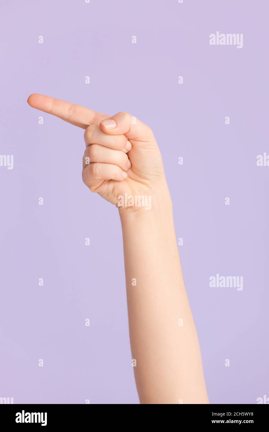 Hand showing letter G on color background. Sign language alphabet Stock ...