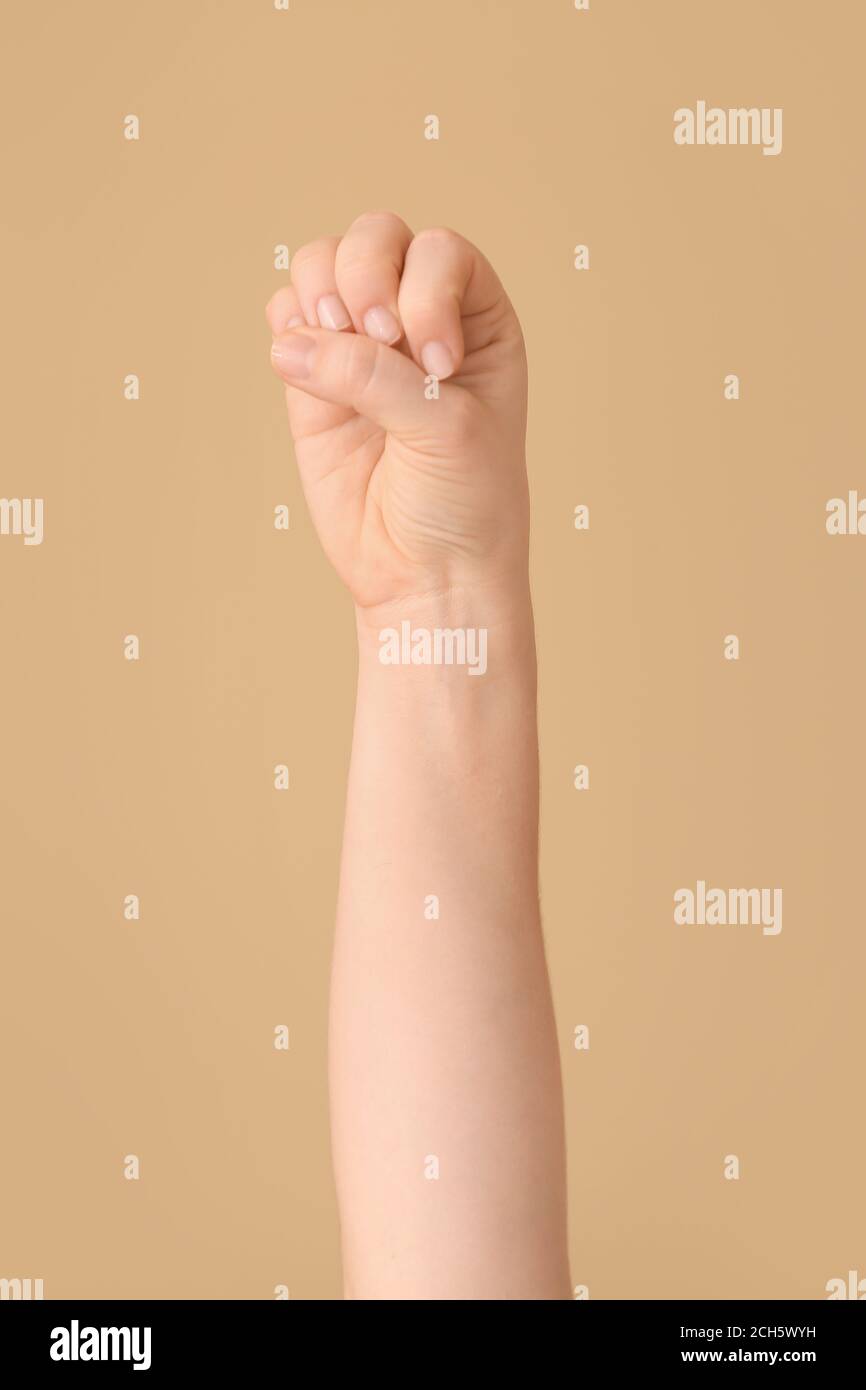 Hand showing letter E on color background. Sign language alphabet Stock ...