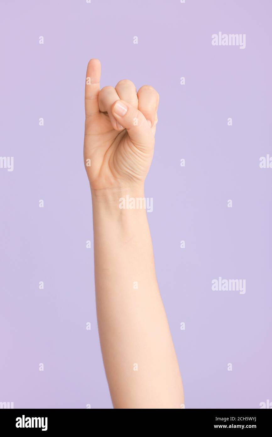 Hand showing letter I on color background. Sign language alphabet Stock ...
