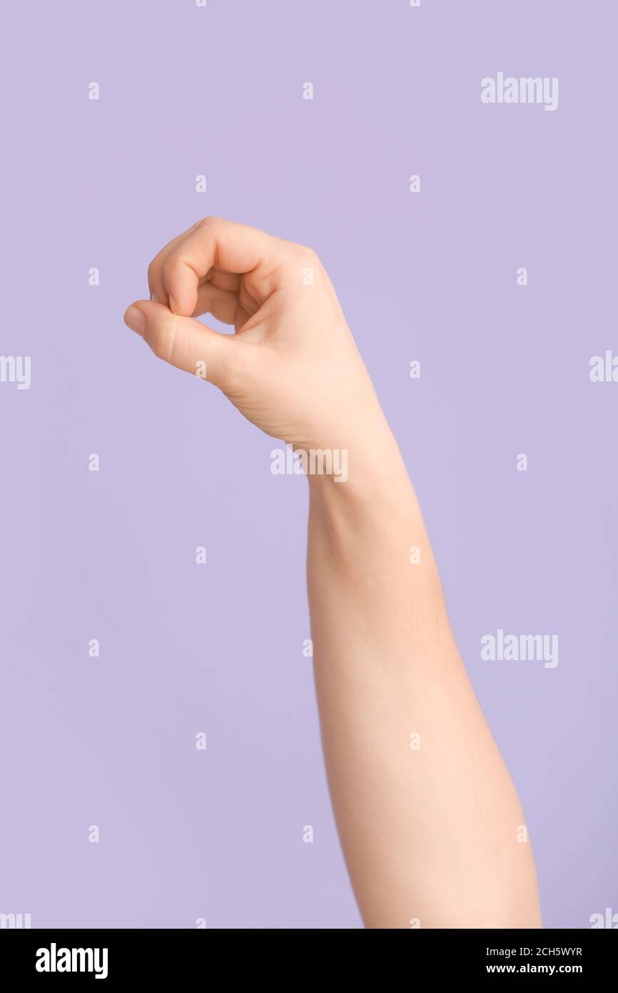 Hand showing letter O on color background. Sign language alphabet Stock ...