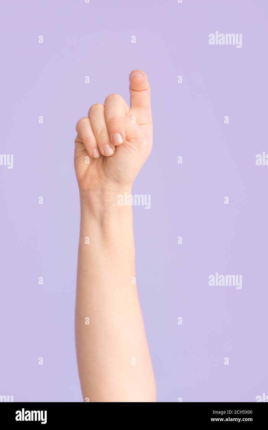 Hand showing letter X on color background. Sign language alphabet Stock ...