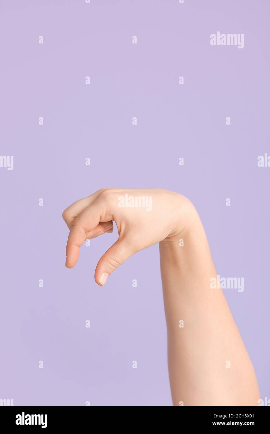 Hand showing letter Q on color background. Sign language alphabet Stock ...