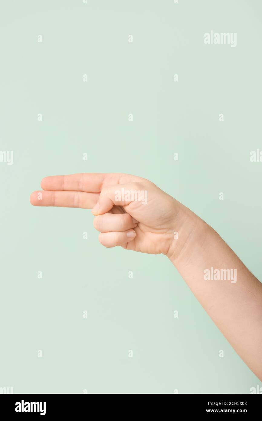Hand showing letter H on color background. Sign language alphabet Stock ...