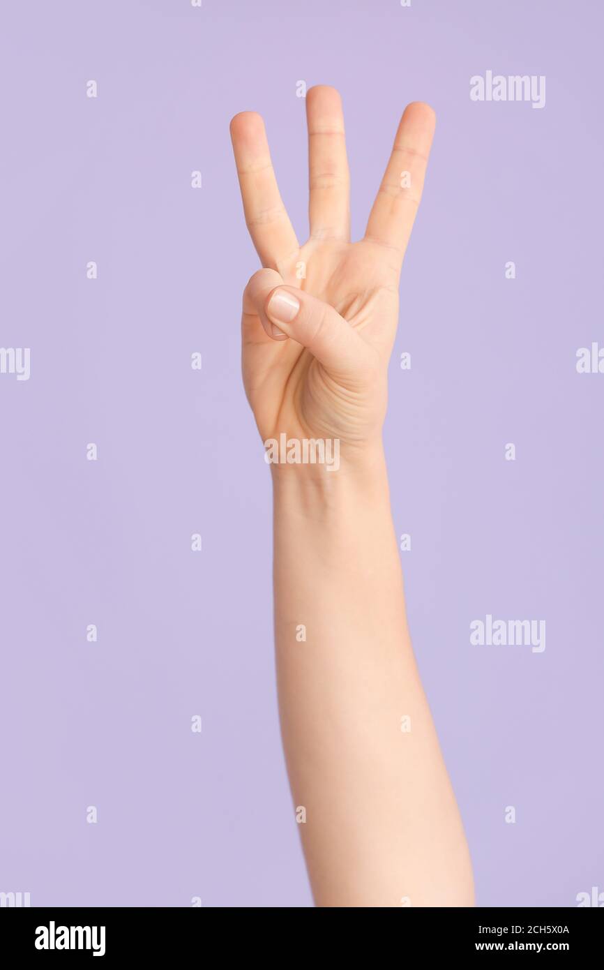 Hand showing letter W on color background. Sign language alphabet Stock ...