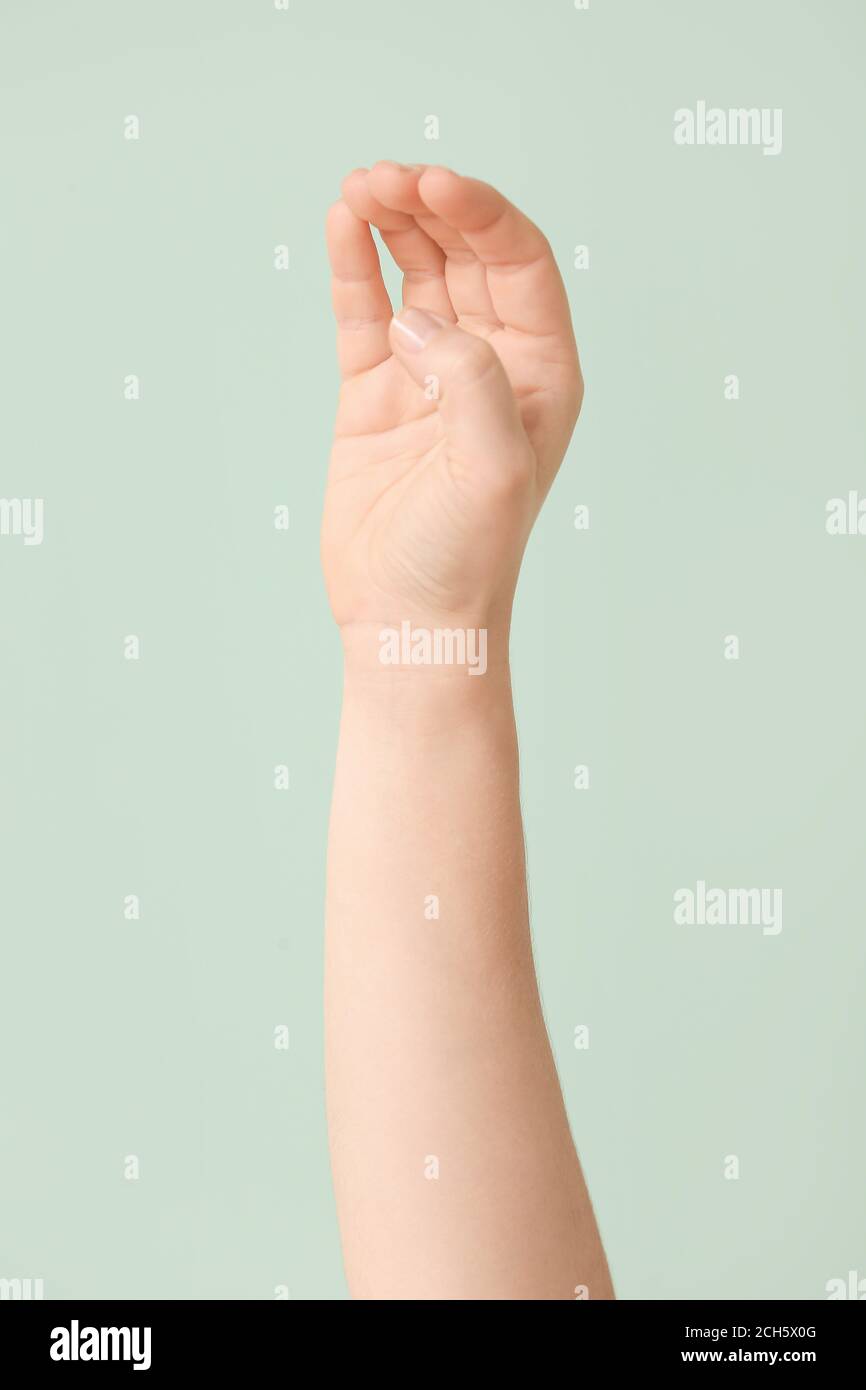 Hand showing letter C on color background. Sign language alphabet Stock ...
