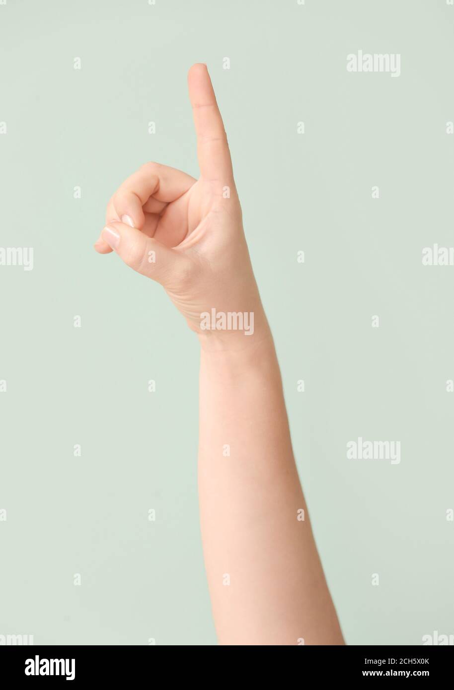 Hand showing letter D on color background. Sign language alphabet Stock ...