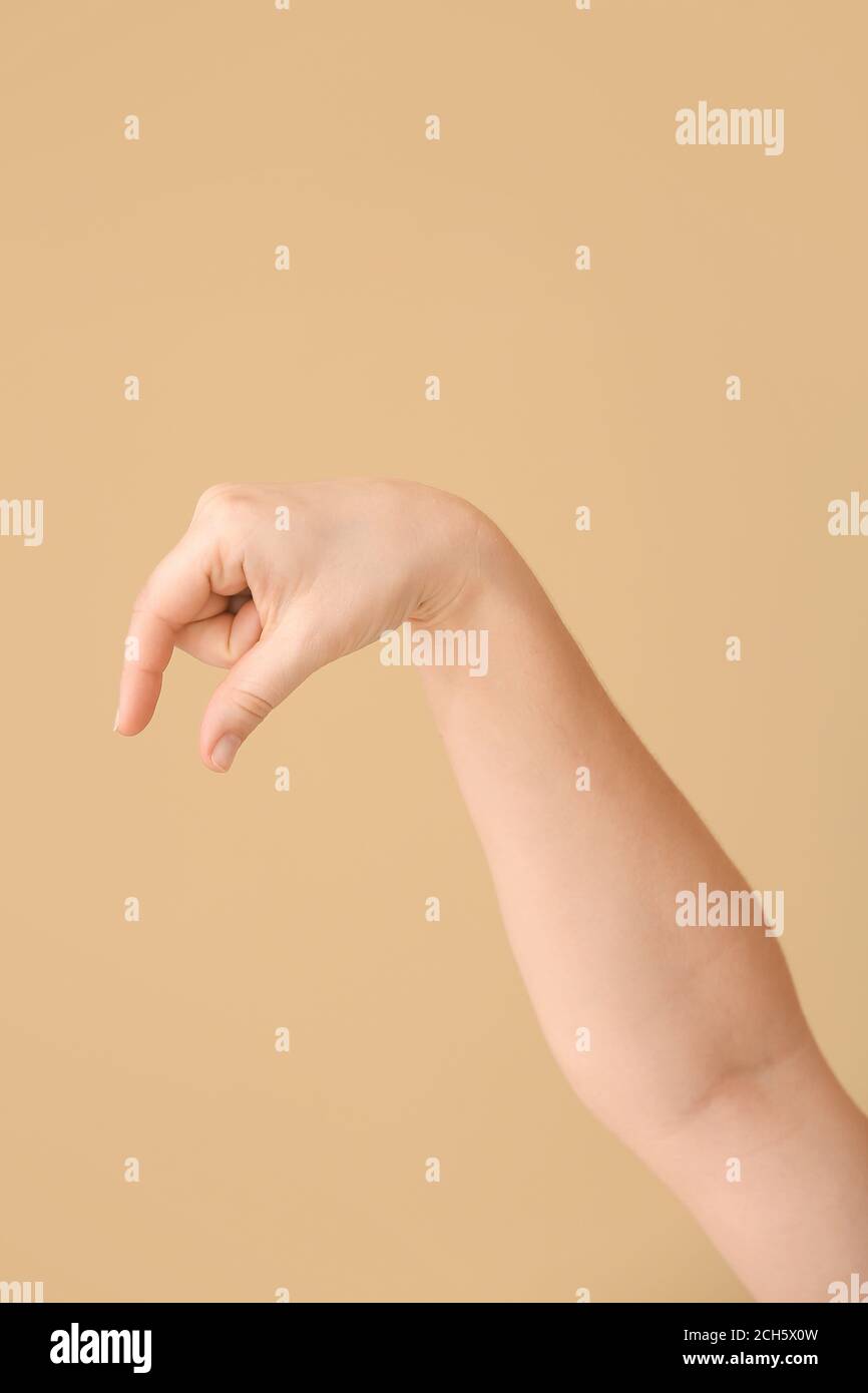 Hand showing letter Q on color background. Sign language alphabet Stock ...