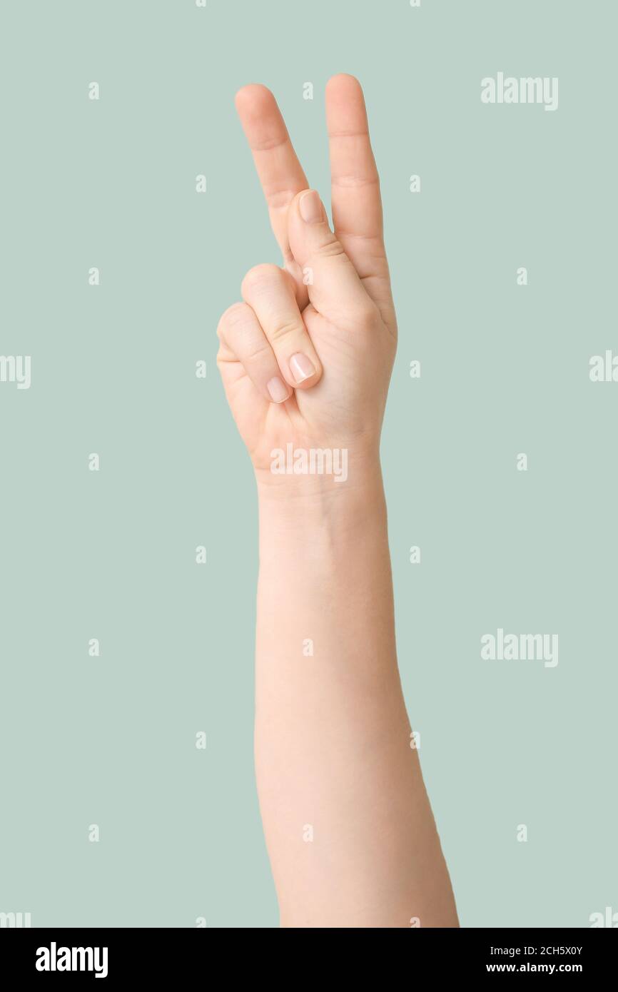 Hand showing letter K on color background. Sign language alphabet Stock ...