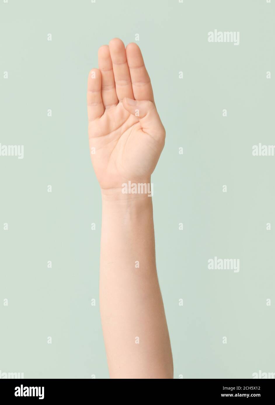 Hand showing letter B on color background. Sign language alphabet Stock ...