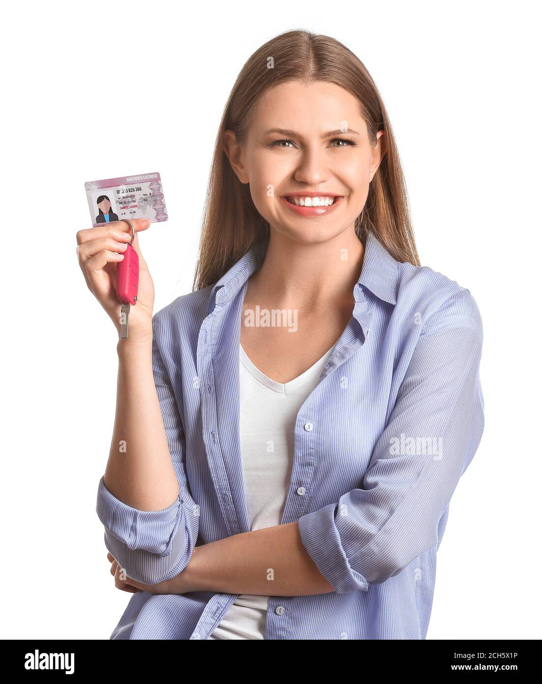Happy young woman with driving license on white background Stock Photo ...