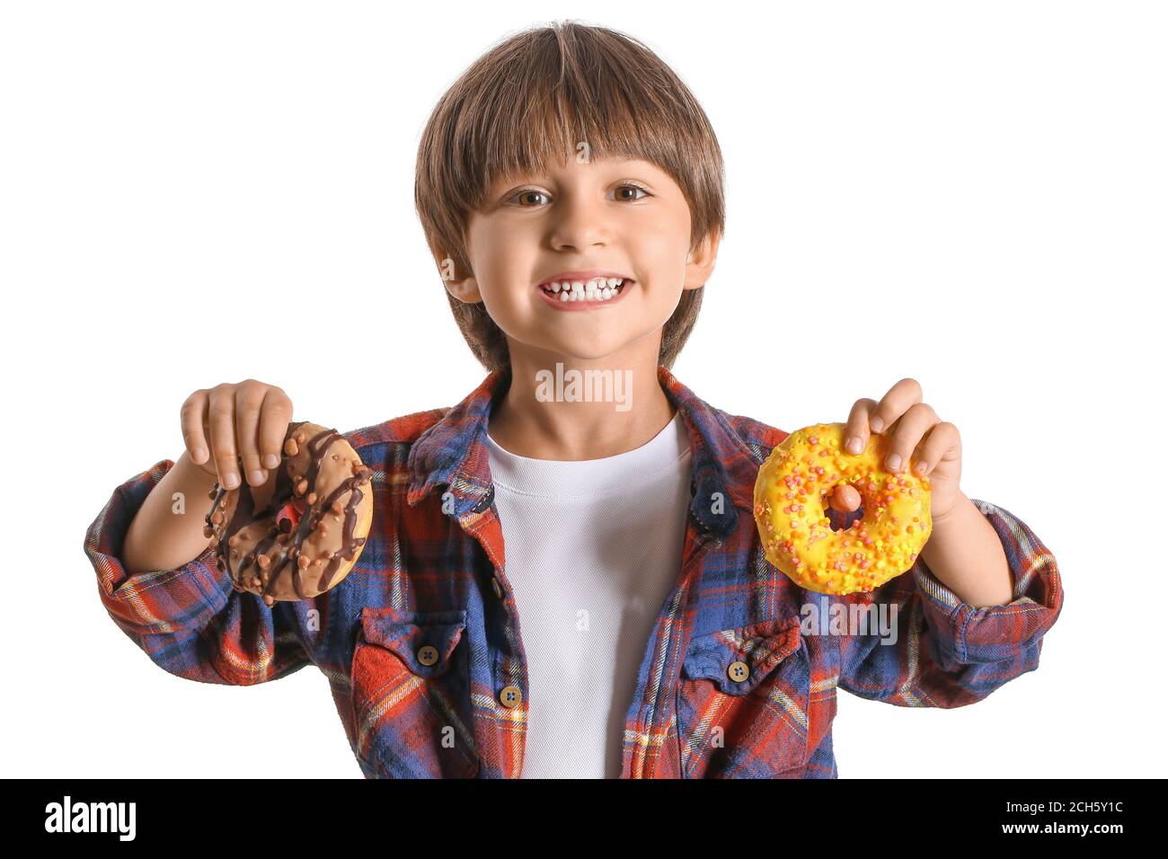 Funny little boy with donuts on white background Stock Photo - Alamy
