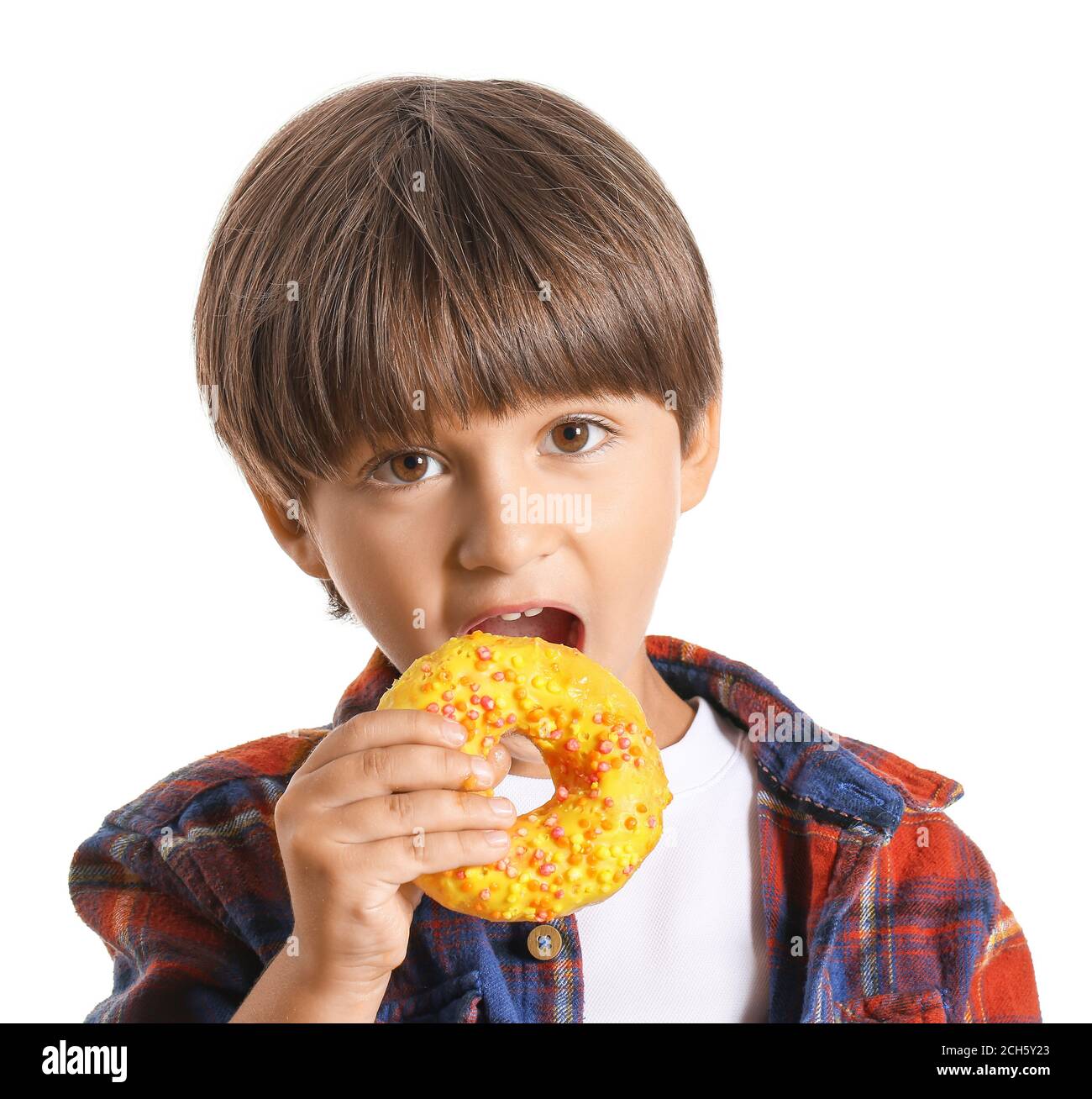 Funny little boy with donut on white background Stock Photo - Alamy