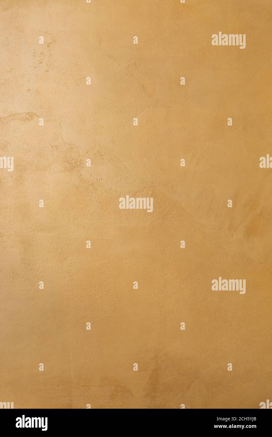 Mustard color microcement texture background Stock Photo - Alamy