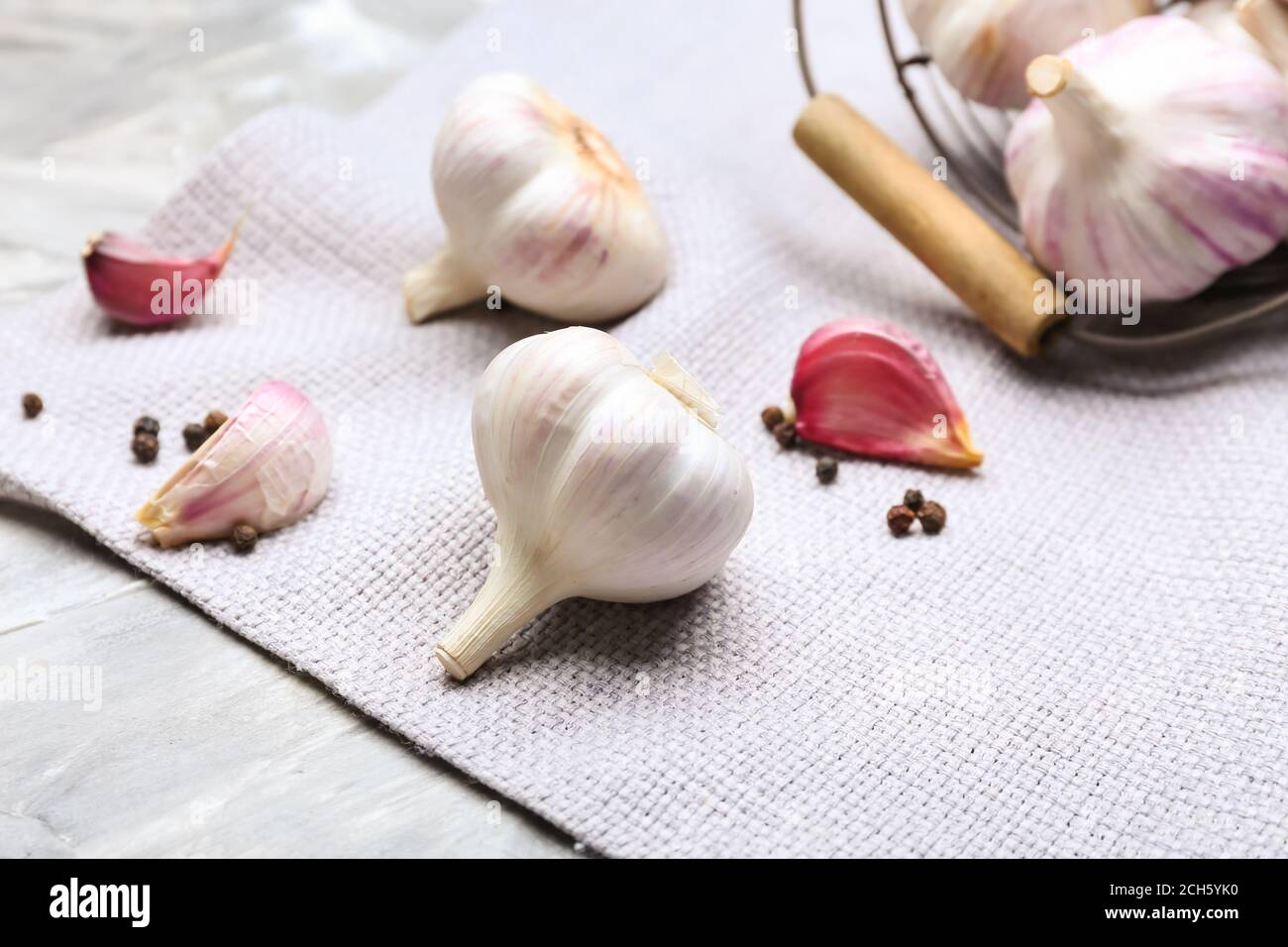 Fresh garlic on grey background Stock Photo - Alamy