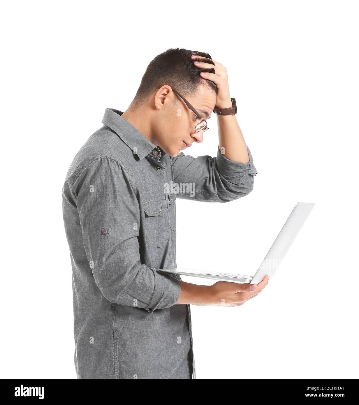 Male programmer with laptop on white background Stock Photo - Alamy