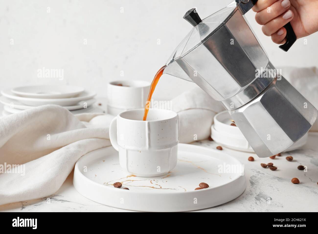 Woman pouring aromatic coffee beans hi-res stock photography and images ...