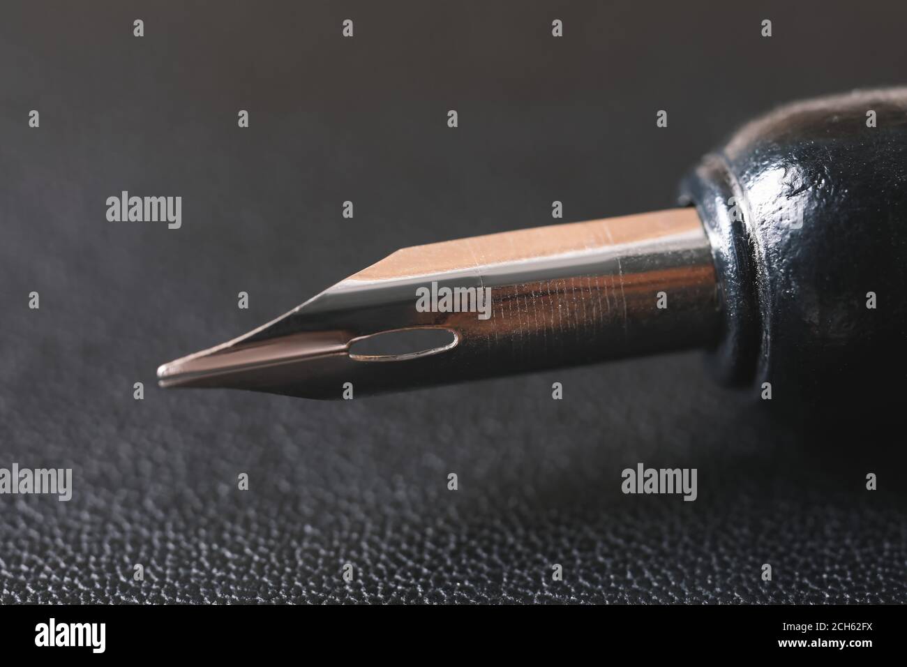 Fountain pen on dark background Stock Photo - Alamy