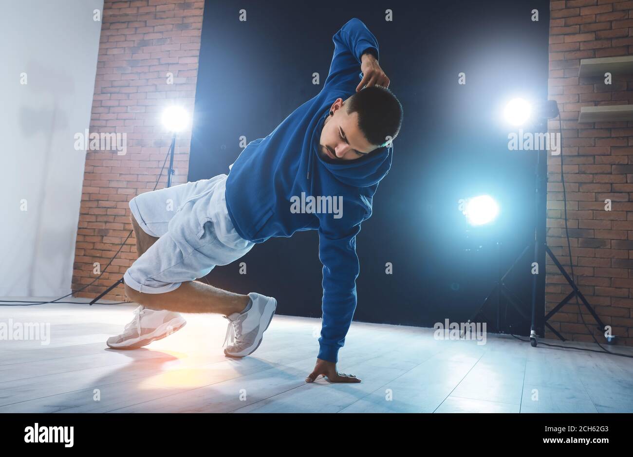 Male hip-hop dancer in studio Stock Photo - Alamy