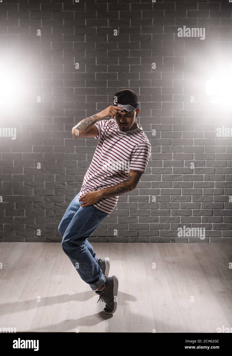 Male hip-hop dancer in studio Stock Photo - Alamy