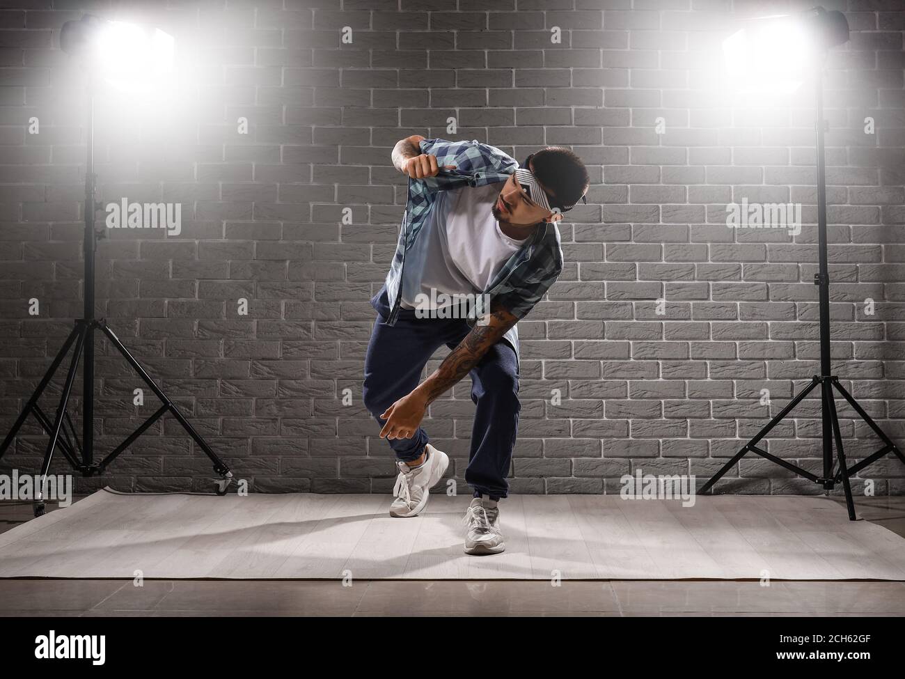 Male hip-hop dancer in studio Stock Photo - Alamy
