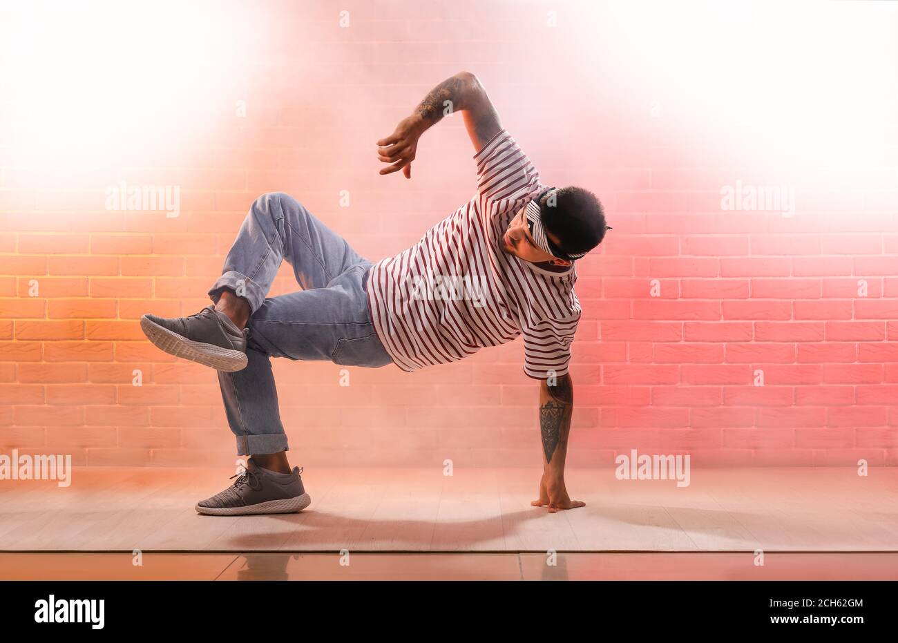 Male hip-hop dancer in studio Stock Photo - Alamy