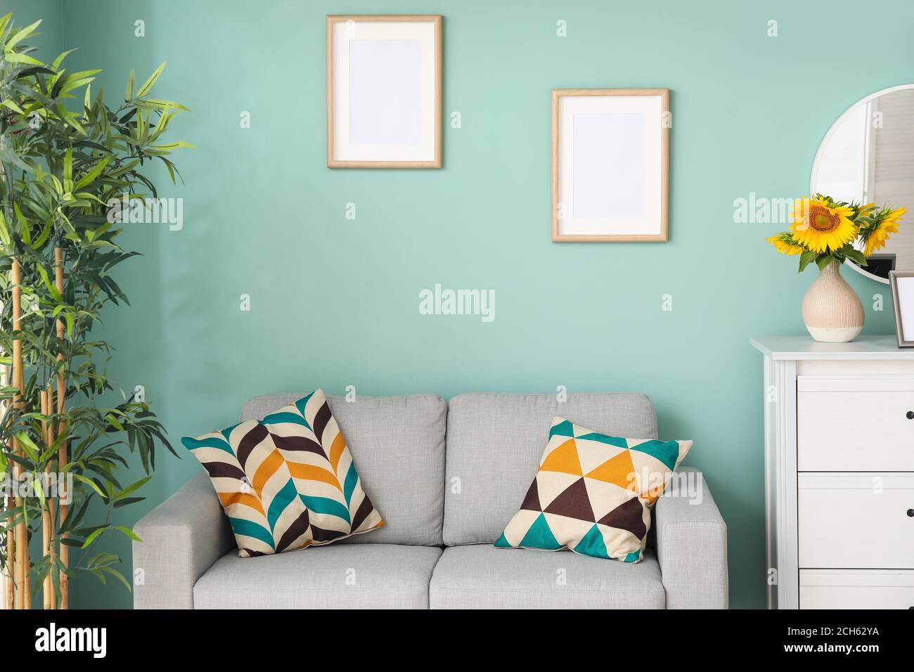 Interior of room with photo frames Stock Photo - Alamy