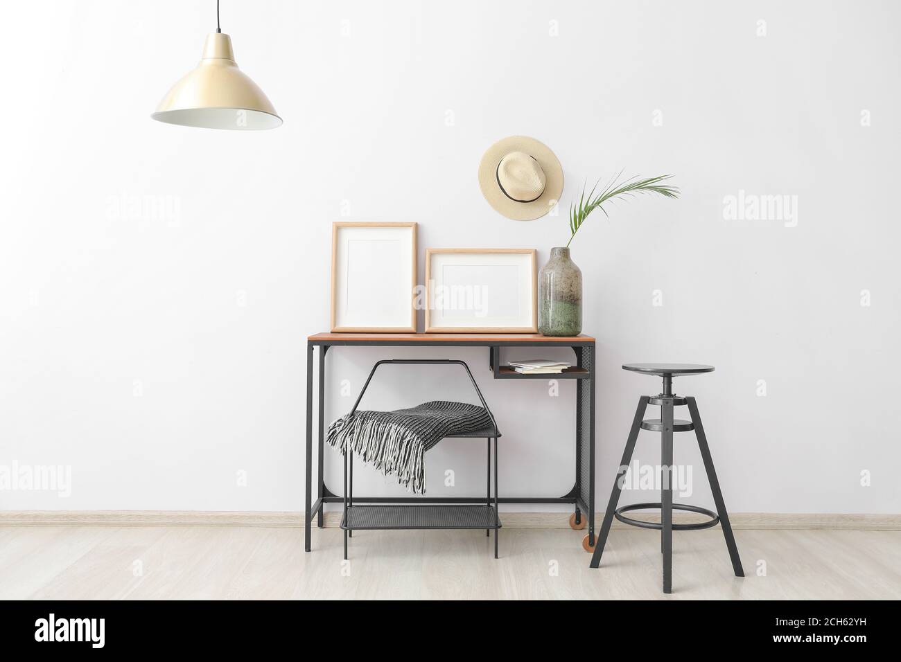 Interior of room with photo frames Stock Photo - Alamy