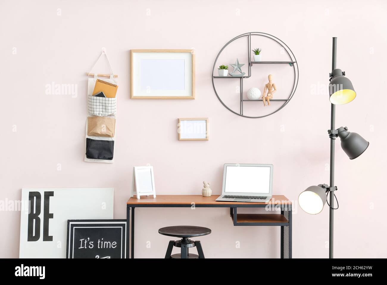 Interior of room with photo frames Stock Photo - Alamy