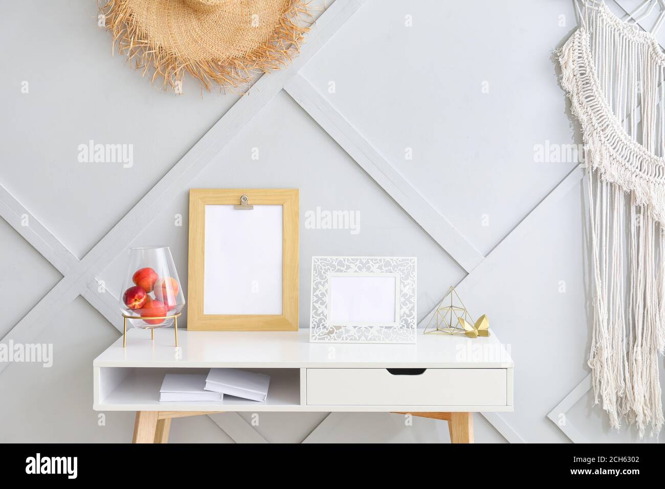 Interior of room with photo frames Stock Photo - Alamy