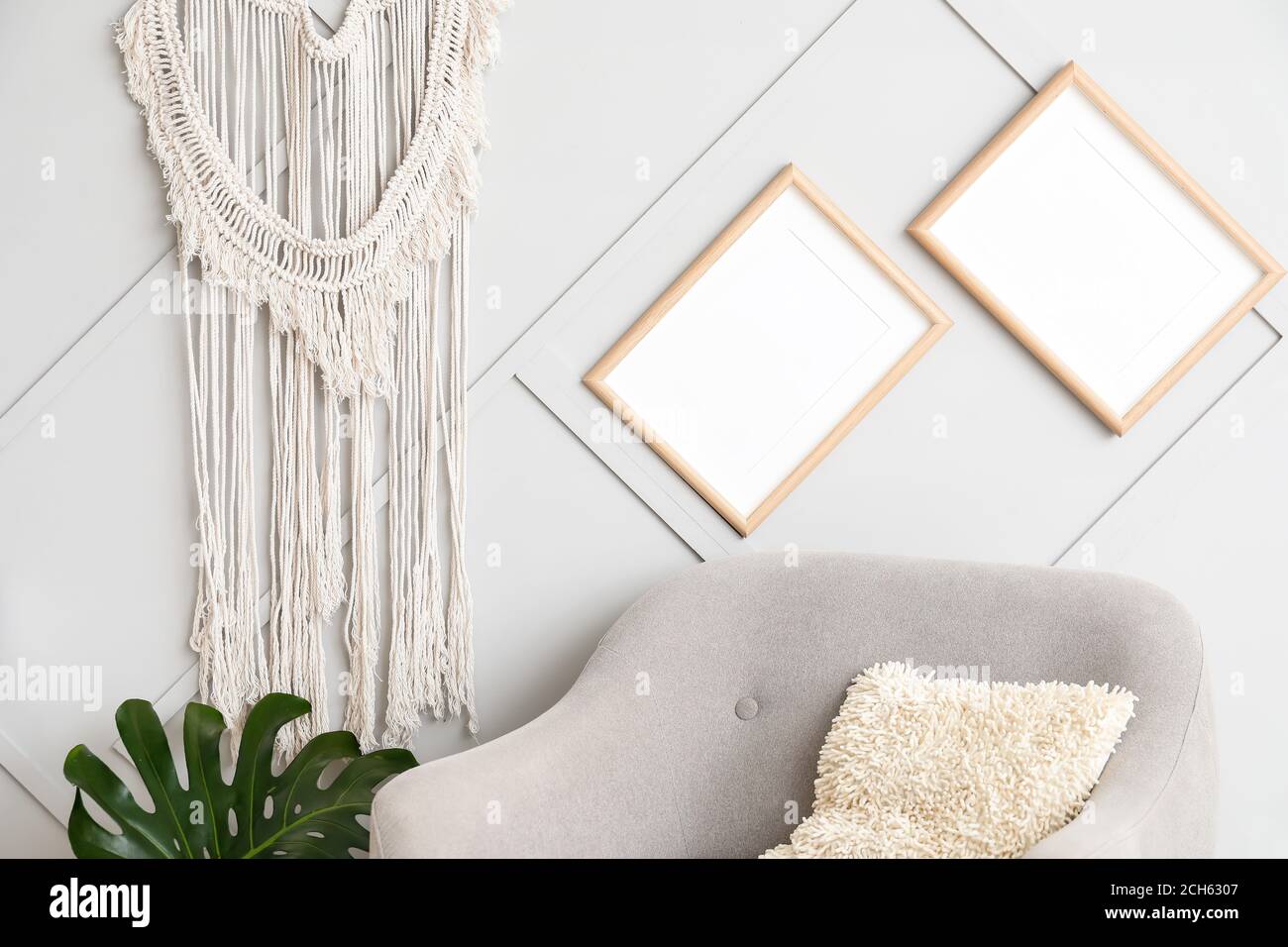 Interior of room with photo frames Stock Photo - Alamy