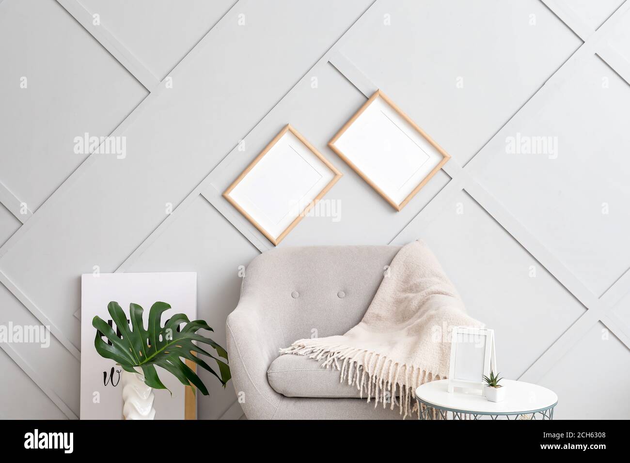 Interior of room with photo frames Stock Photo - Alamy