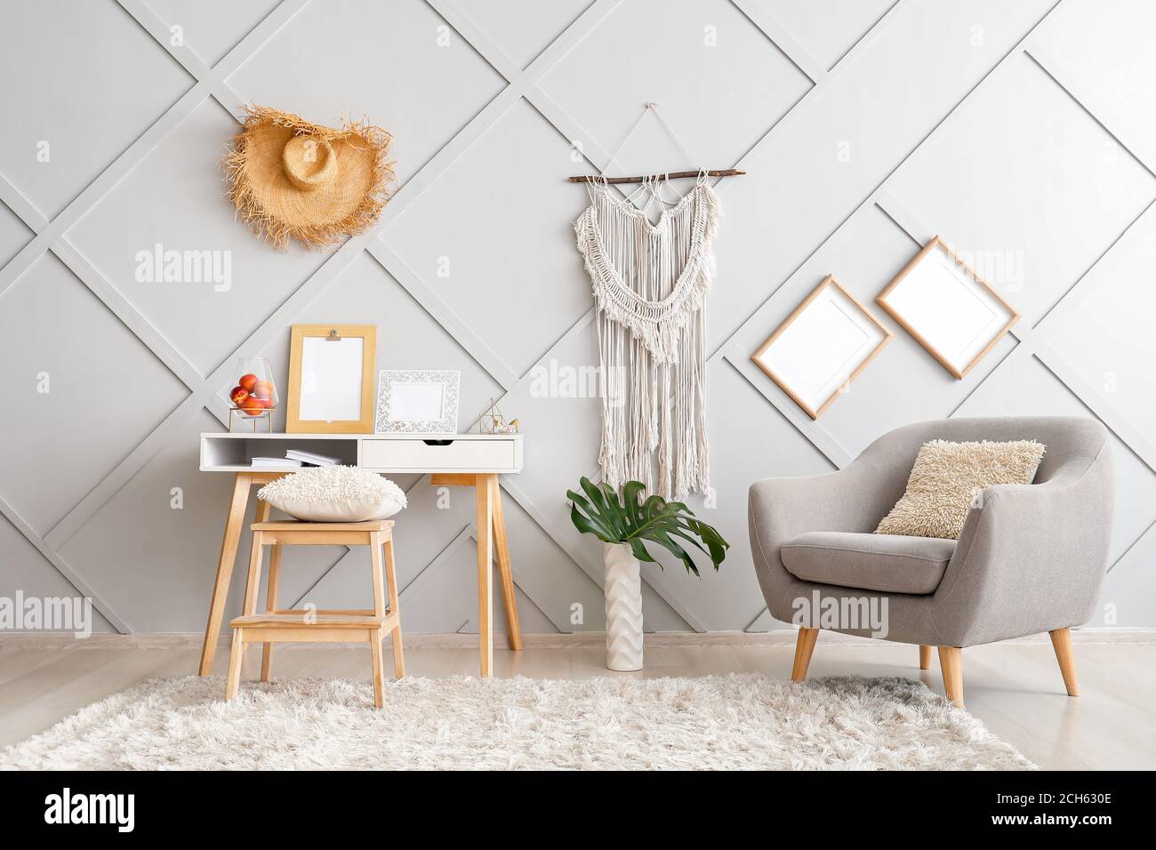 Interior of room with photo frames Stock Photo - Alamy