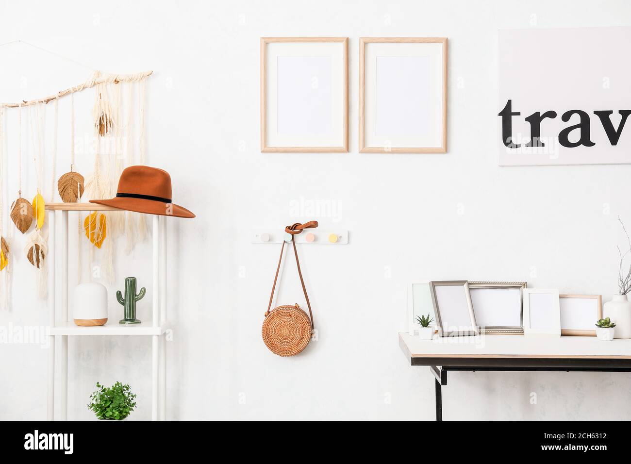 Interior of room with photo frames Stock Photo - Alamy