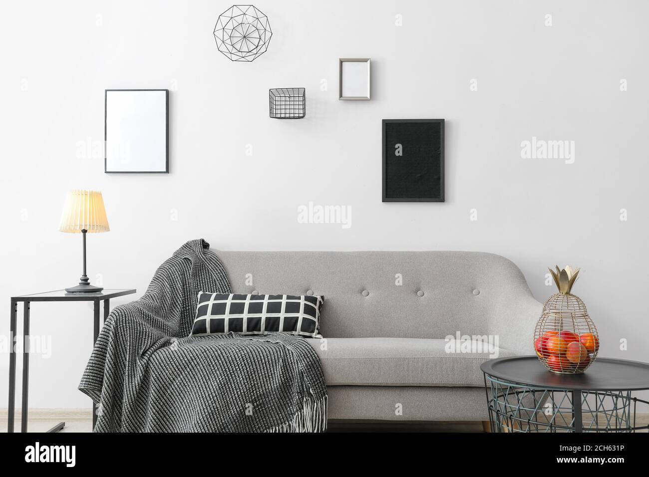 Interior of room with photo frames Stock Photo - Alamy