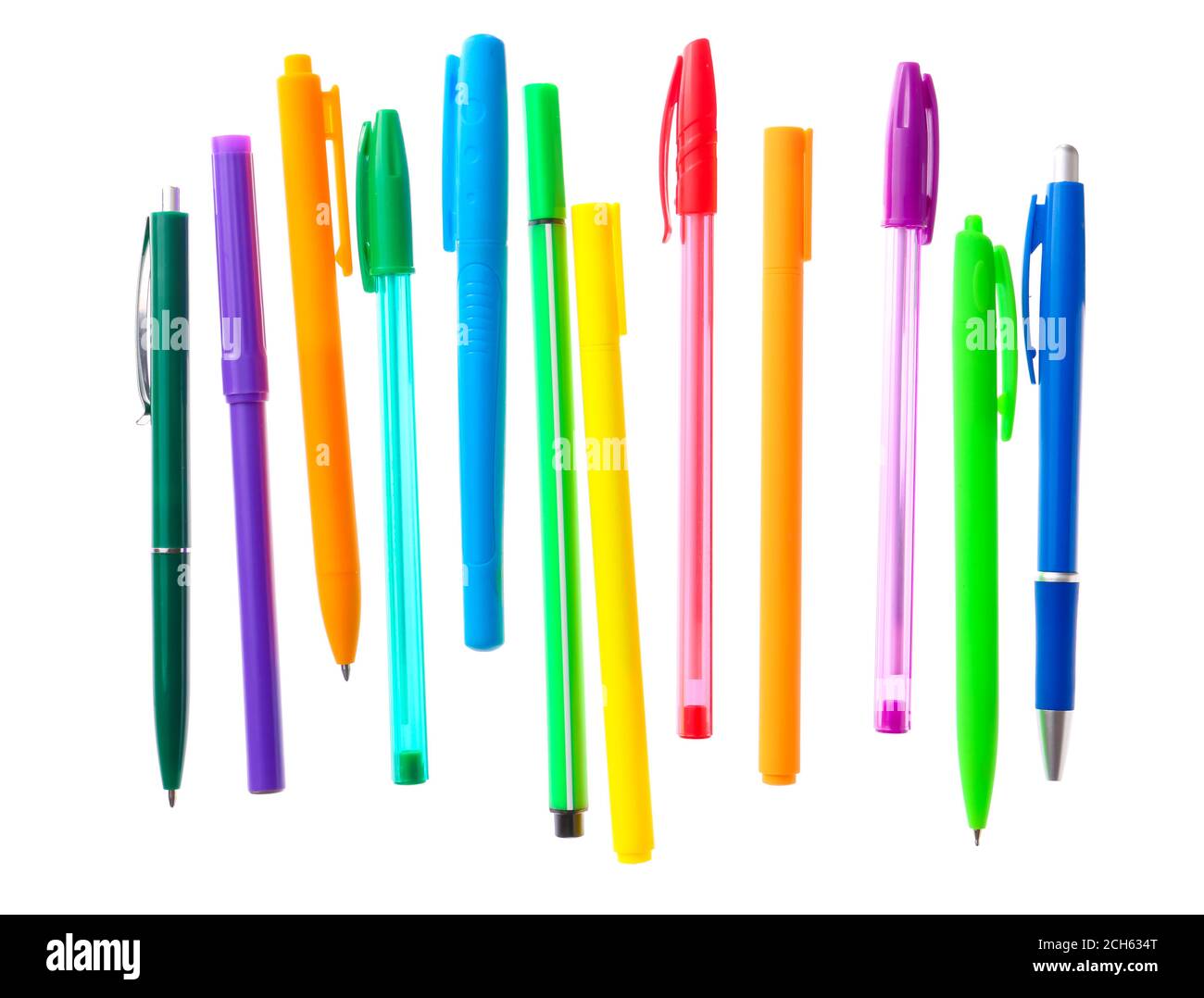 Different pens on white background Stock Photo - Alamy