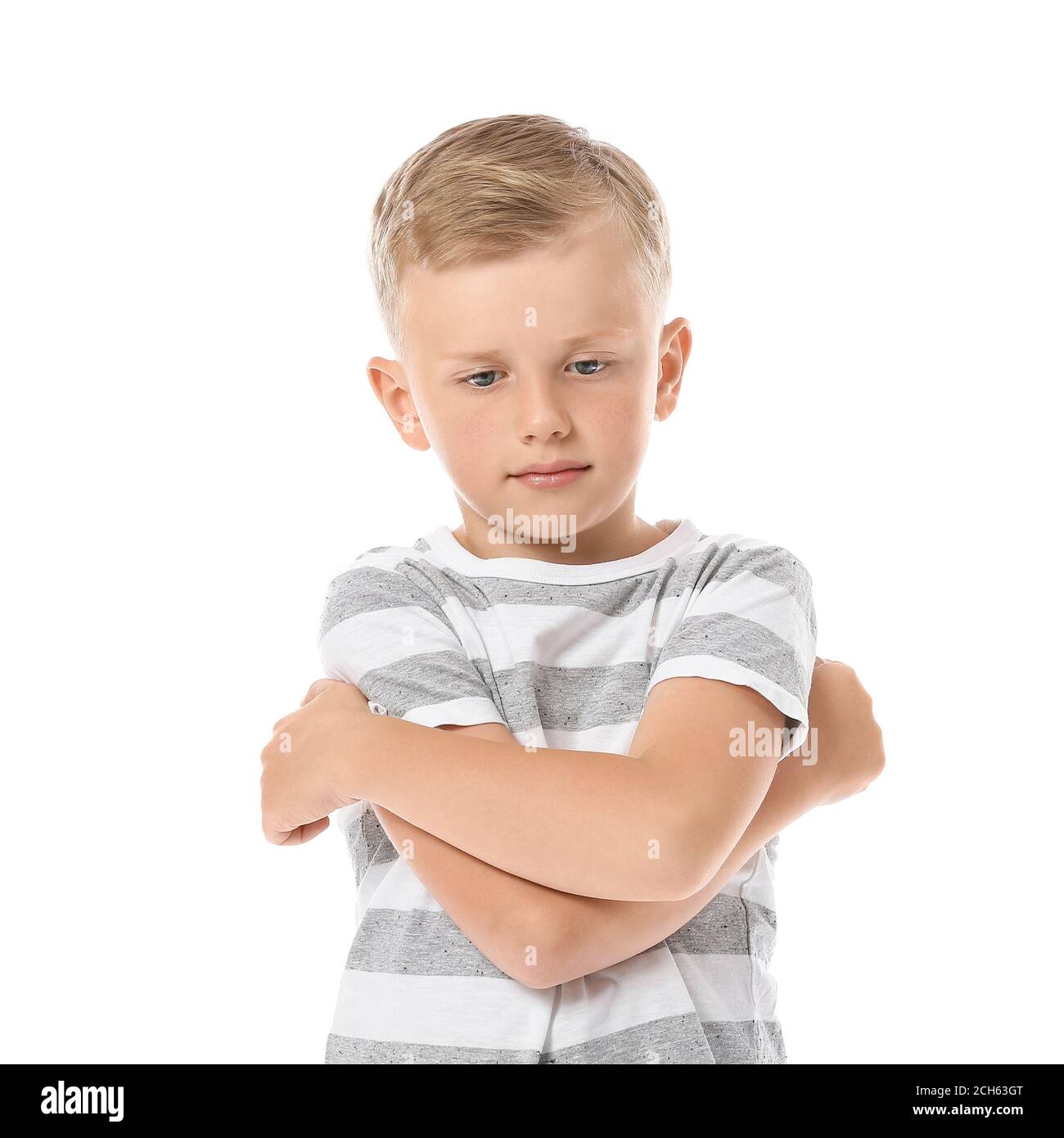 Sad little boy with autistic disorder on white background Stock Photo ...