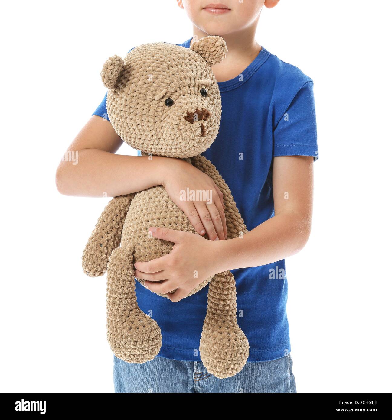 Little boy with autistic disorder and toy on white background Stock ...