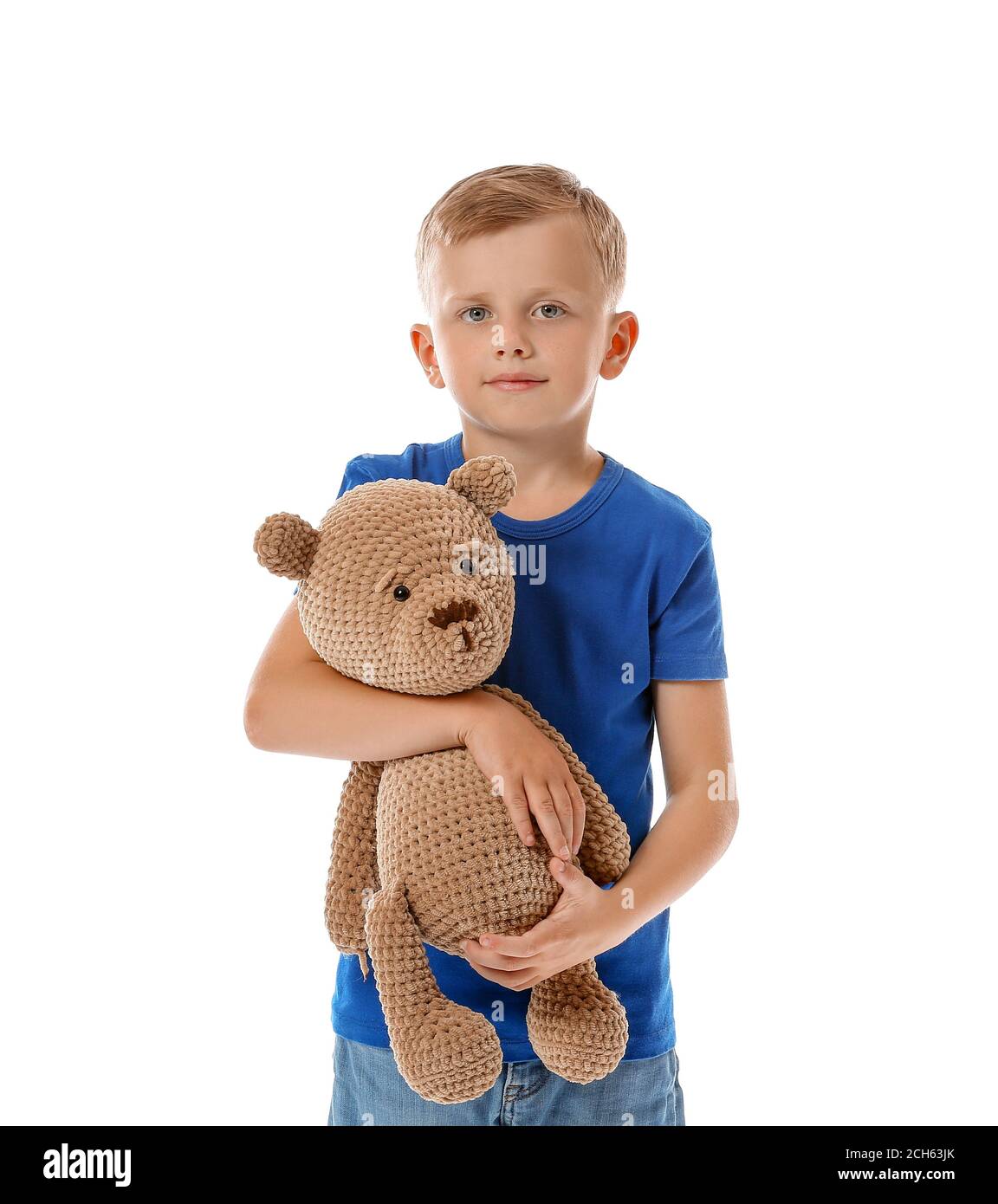 Little boy with autistic disorder and toy on white background Stock ...