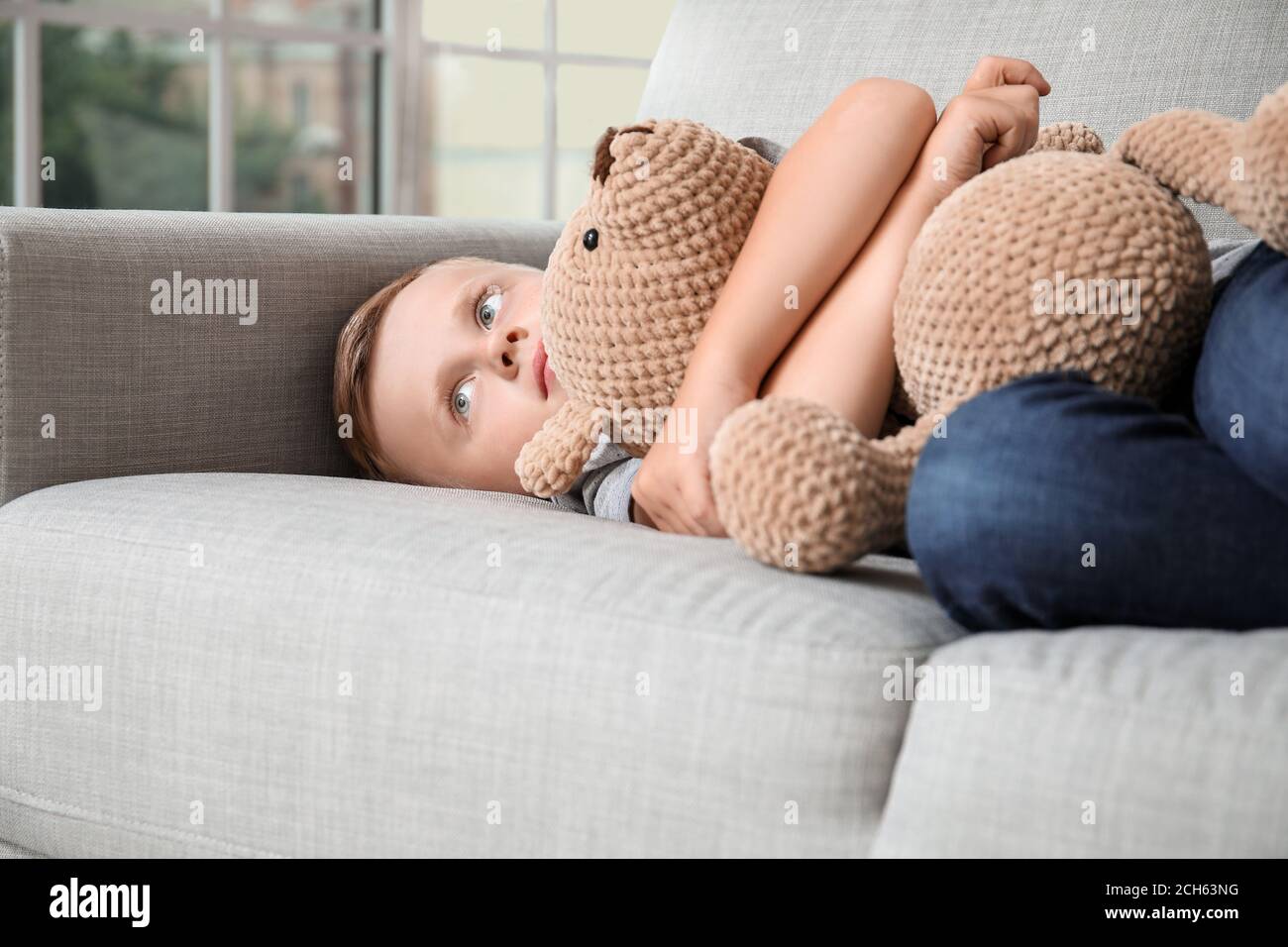 Little boy with autistic disorder at home Stock Photo - Alamy
