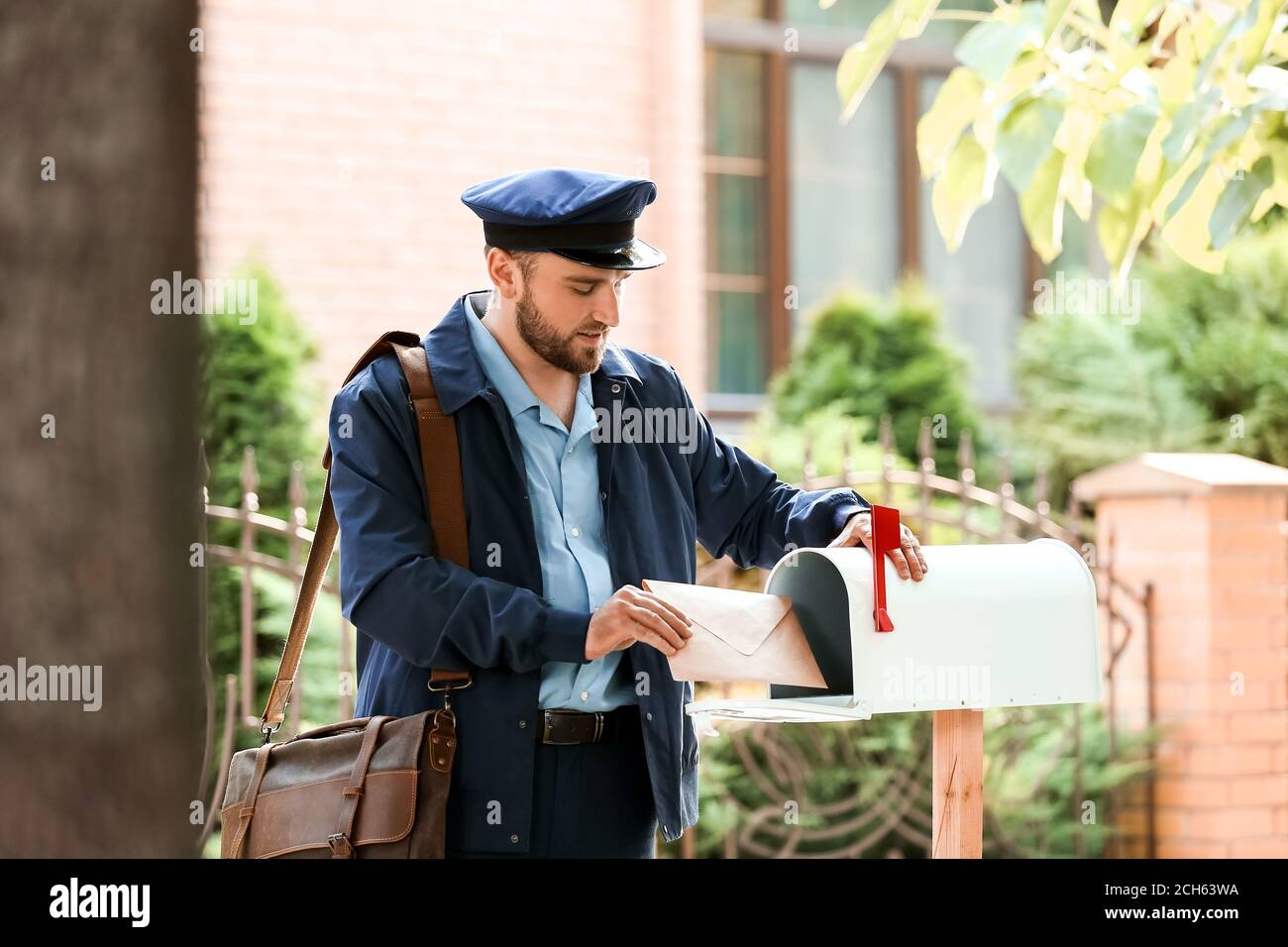 Putting letter in box hi-res stock photography and images - Alamy