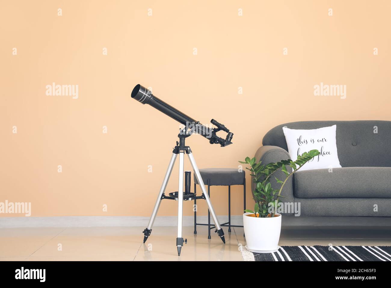 Interior of modern room with telescope Stock Photo - Alamy