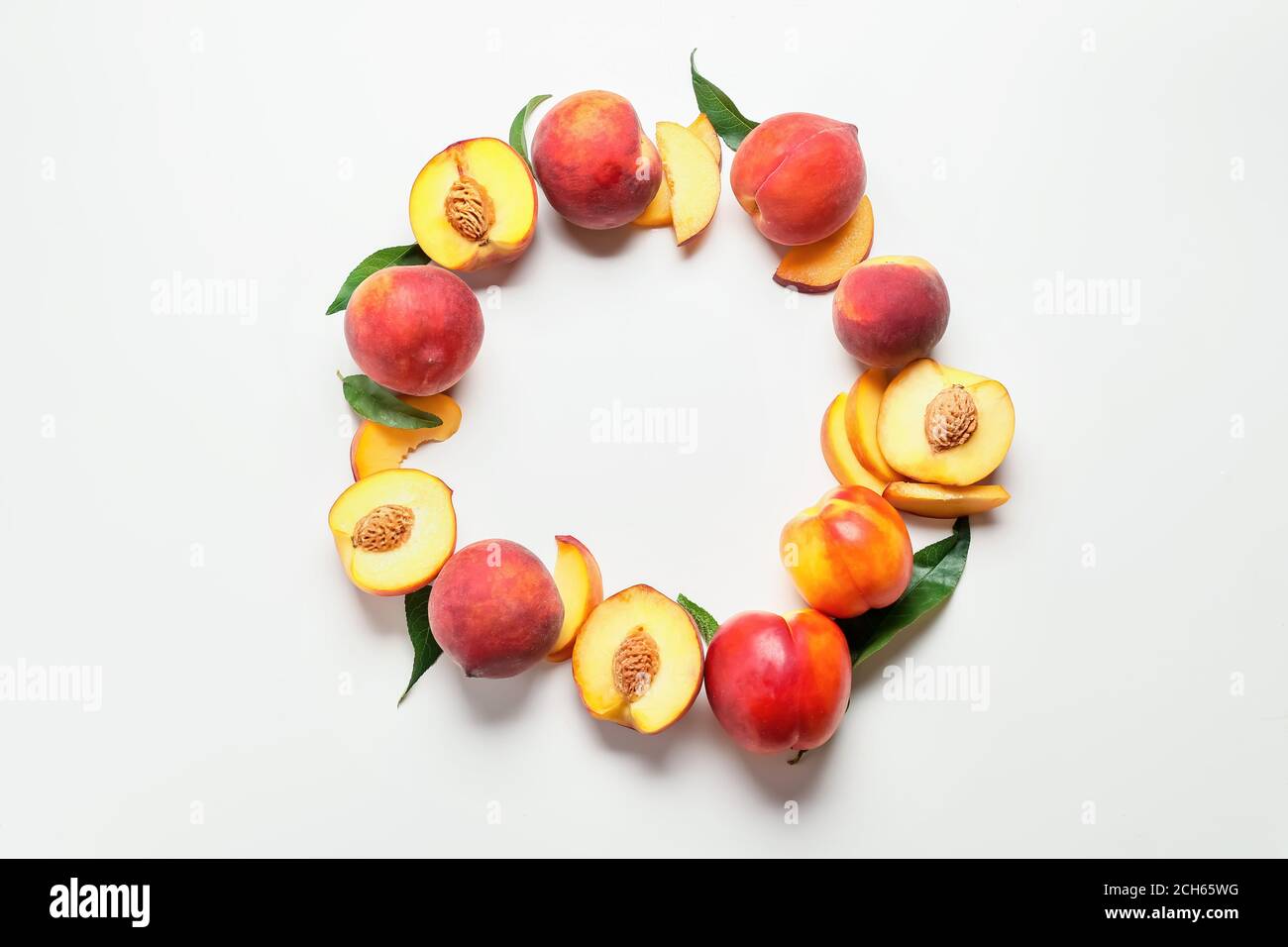 Frame made of sweet ripe peaches on white background Stock Photo - Alamy