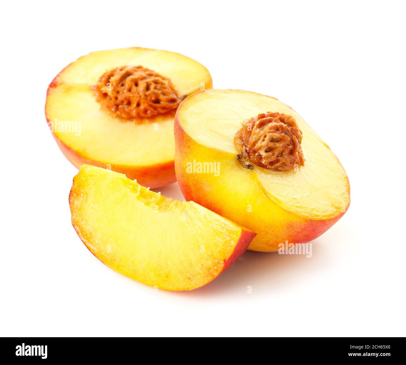 Sweet cut peaches on white background Stock Photo - Alamy